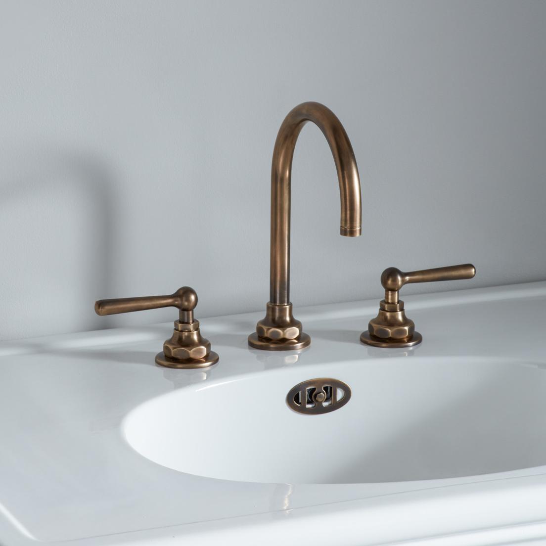 Bill deck mounted high spout basin taps